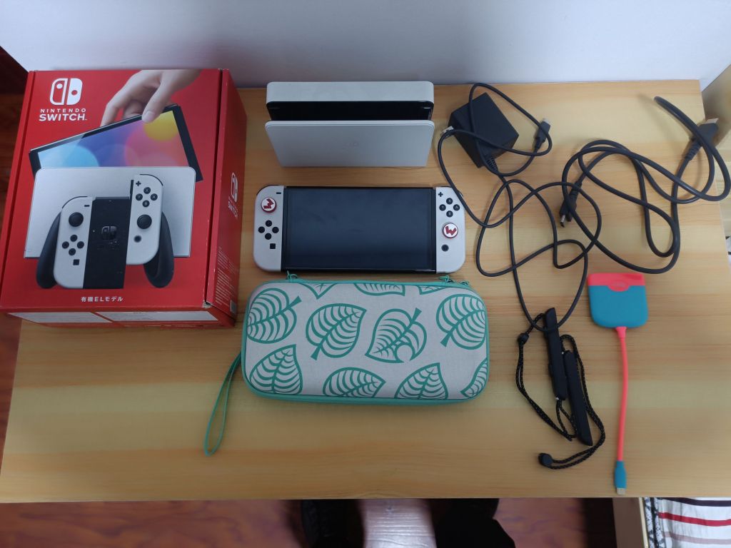 出日版switch OLED，箱说全，另出7个卡带，欢迎打包 178