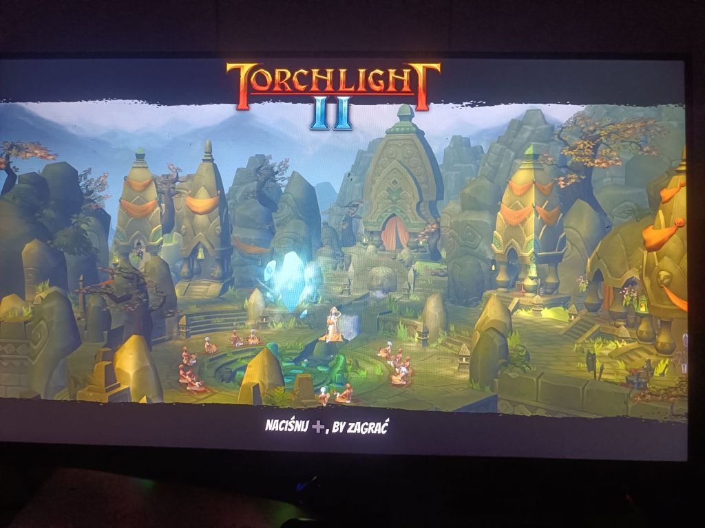 求NS火炬之光2如何设置中文 178